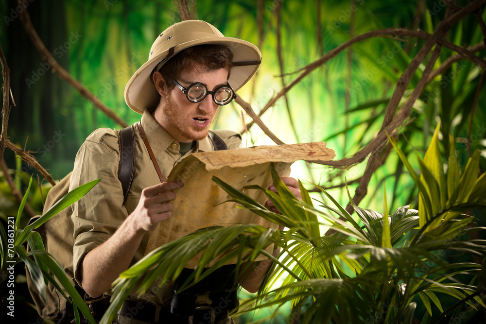 Lost explorer with old map Stock Photo | Adobe Stock