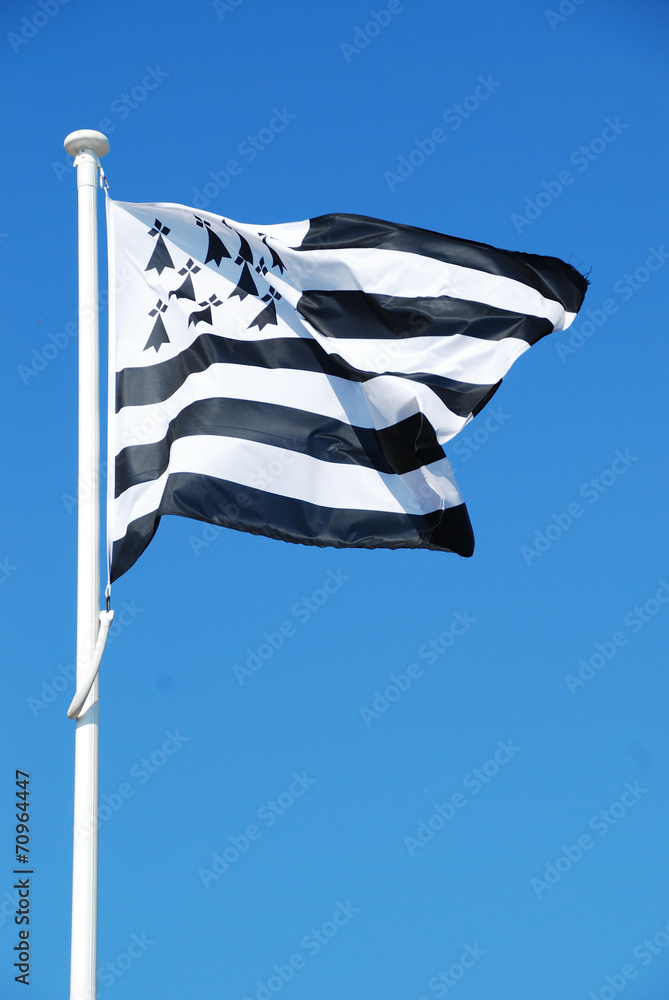 Breton flag floating in the wind Photos | Adobe Stock