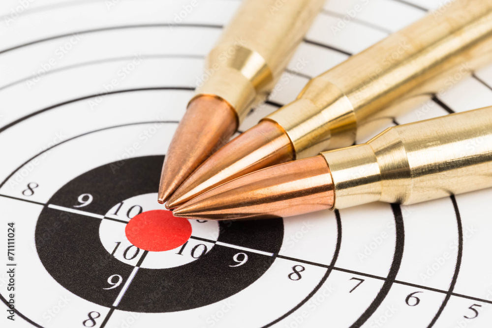 Rifle bullet over target background Stock-Foto | Adobe Stock