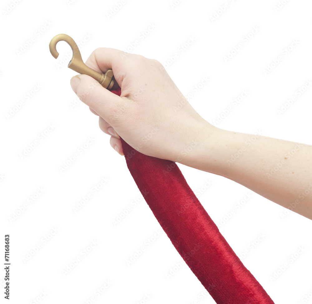 Human hand opening red velvet rope Stock Photo | Adobe Stock
