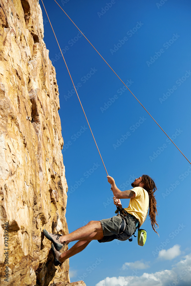 Holding on to that rope Stock Photo | Adobe Stock
