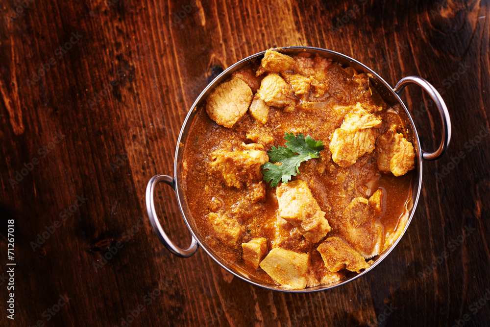 overhead photo of a batli dish with indian butter chicken curry Stock ...