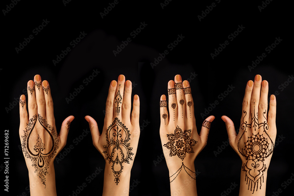 hand with mehendi on black background Stock Photo | Adobe Stock