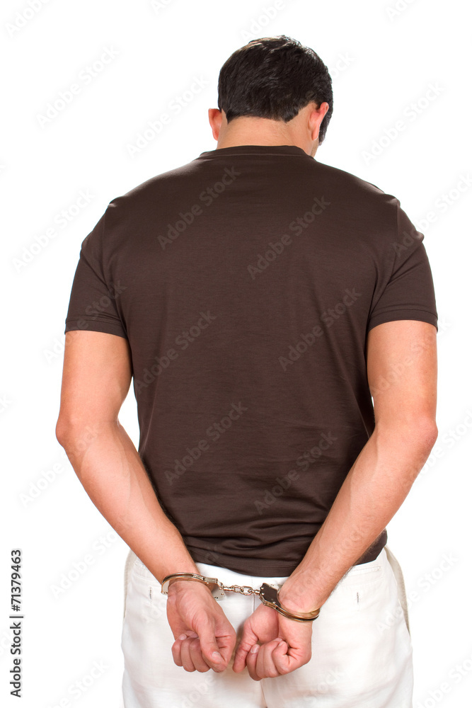 Handcuffed Criminal Stock Photo | Adobe Stock