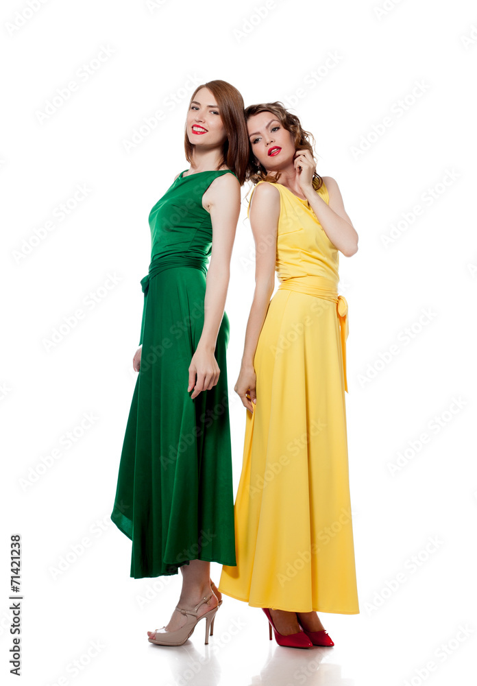 Beautiful young models posing in colorful dresses Stock Photo | Adobe Stock