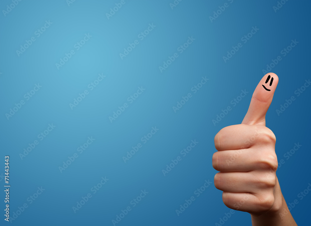 Happy smiley face fingers looking at empty blue background copy Stock ...