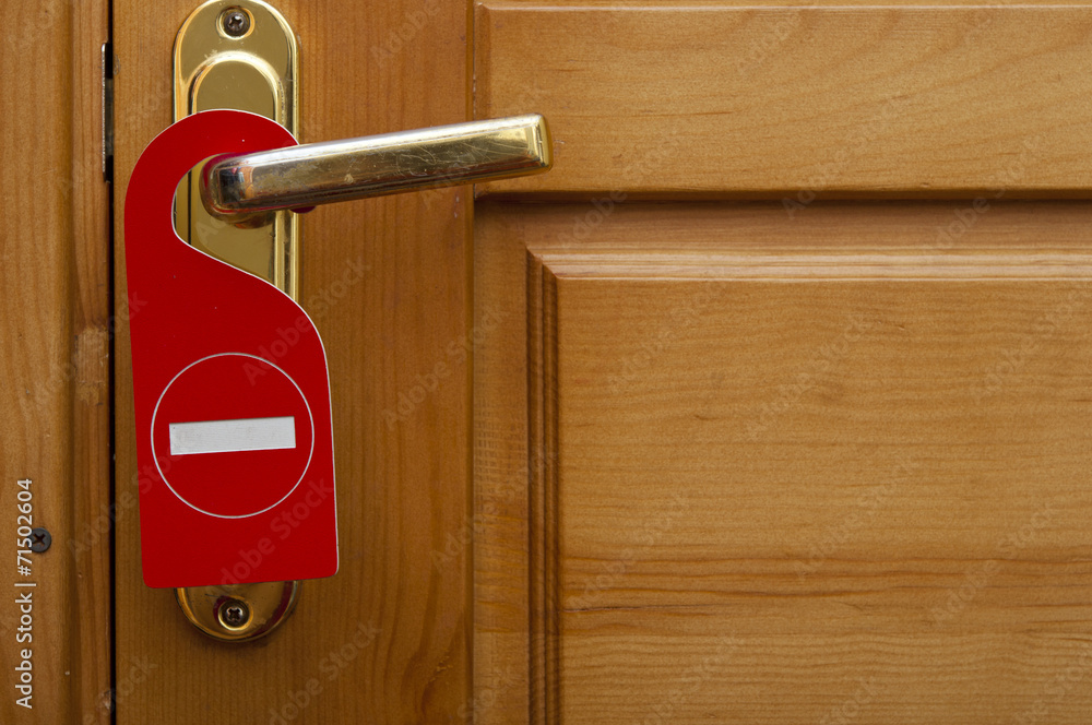 Please do not disturb on a door of number hotel Stock Photo | Adobe Stock