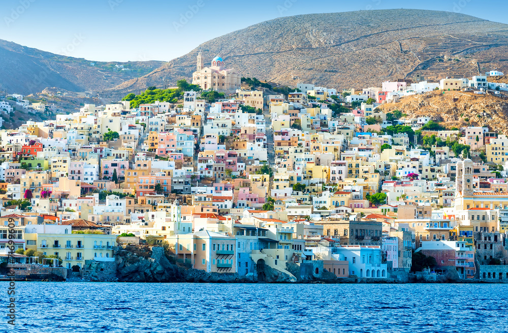 Greek island with colorful houses and yachts. Stock Photo | Adobe Stock
