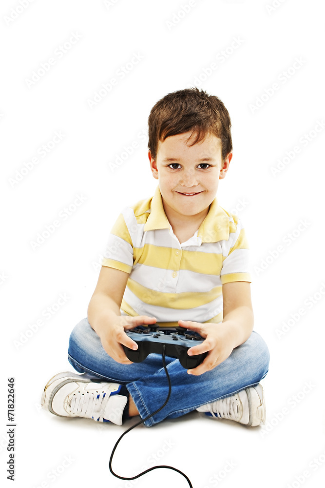 Boy using video game controller Stock Photo | Adobe Stock