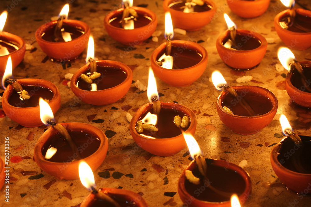 oil lamp in row Stock Photo | Adobe Stock