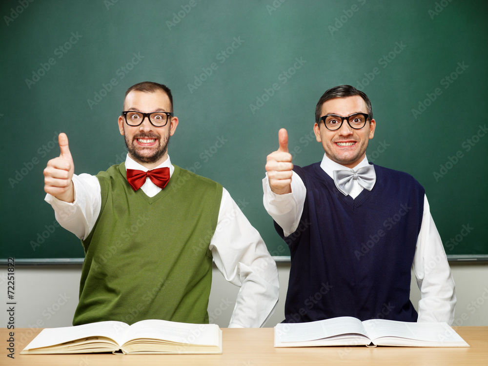 Two male nerds thumbs up Stock Photo | Adobe Stock