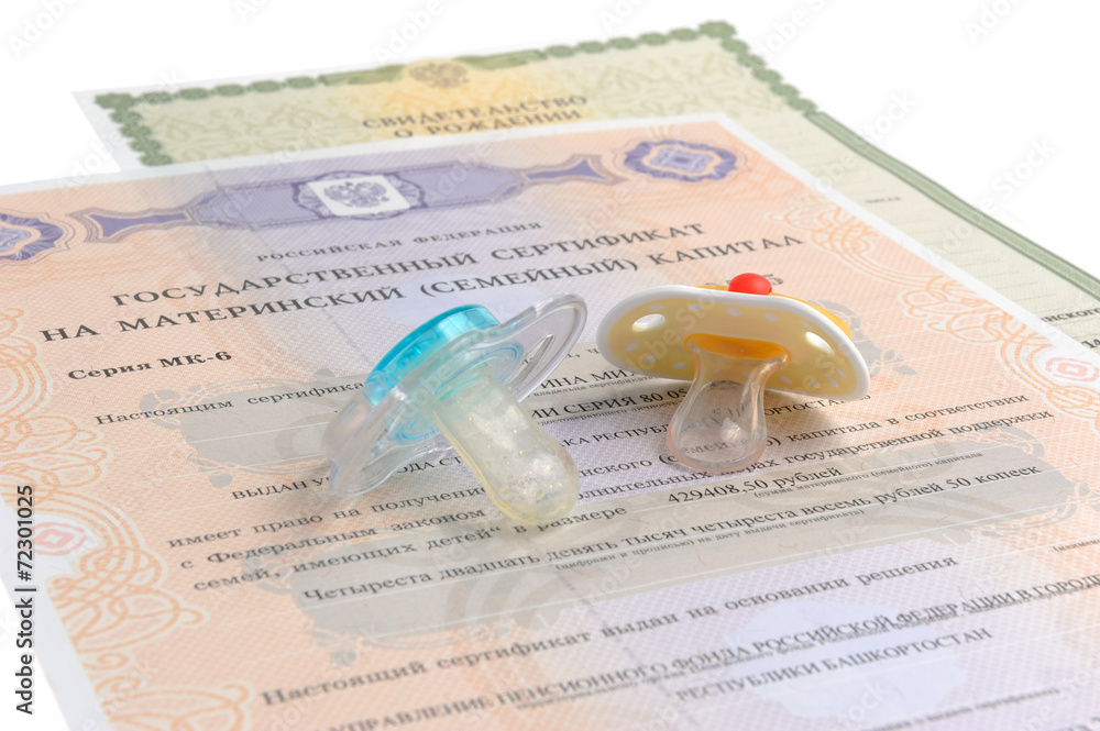 Poster Two baby's dummies with maternal and birth certificates isolated ...