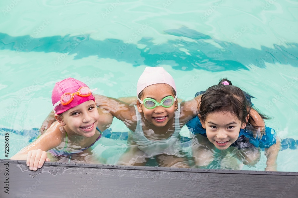 Cute little kids in the swimming pool Stock Photo | Adobe Stock