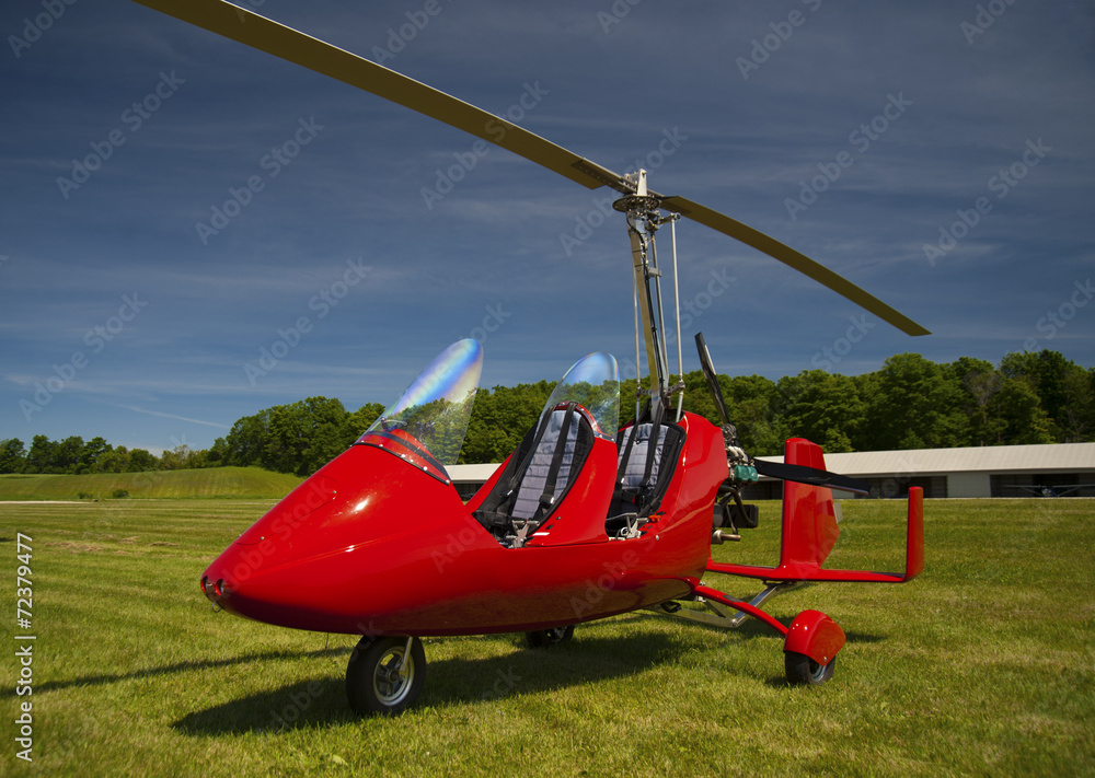Red open-cockpit autogyro Stock Photo | Adobe Stock