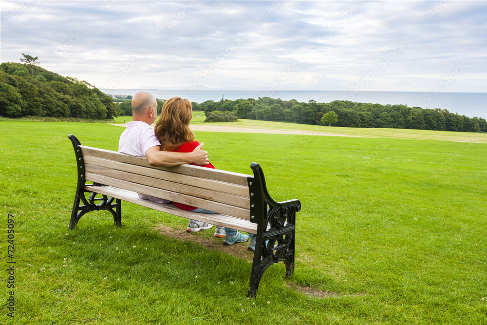 Adult couple on the bench Stock Photo | Adobe Stock