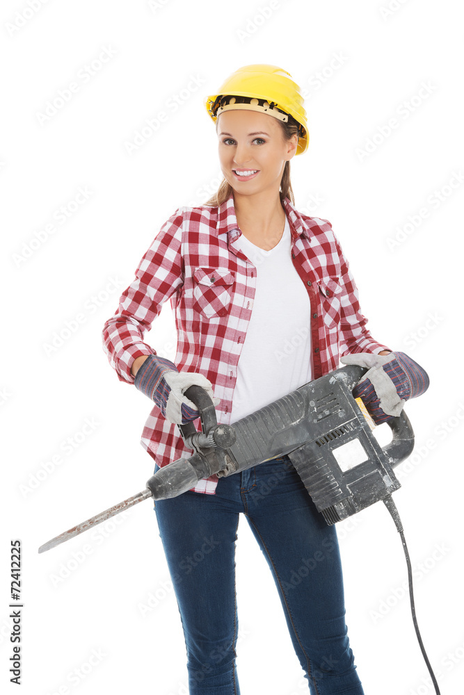 Woman holding drill Stock Photo | Adobe Stock