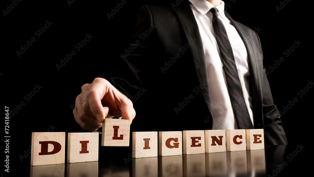 Wooden Pieces with Diligence Text on Black Background Stock-Foto ...