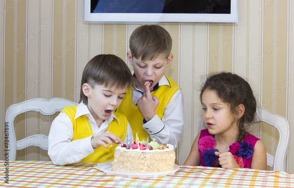 kids have fun eating birthday cake Stock Photo | Adobe Stock