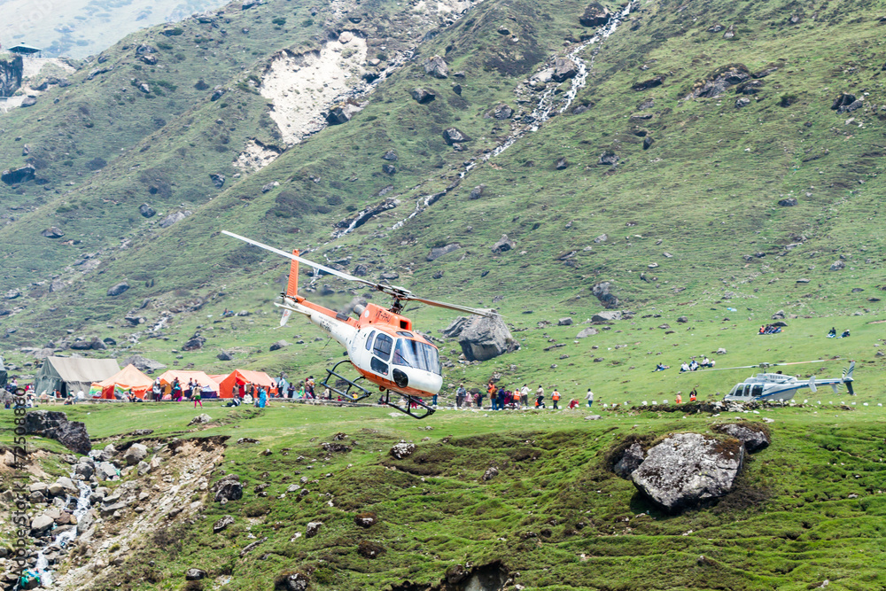 A helicopter at Kedarnath temple in the Himalayas. Stock Photo | Adobe ...