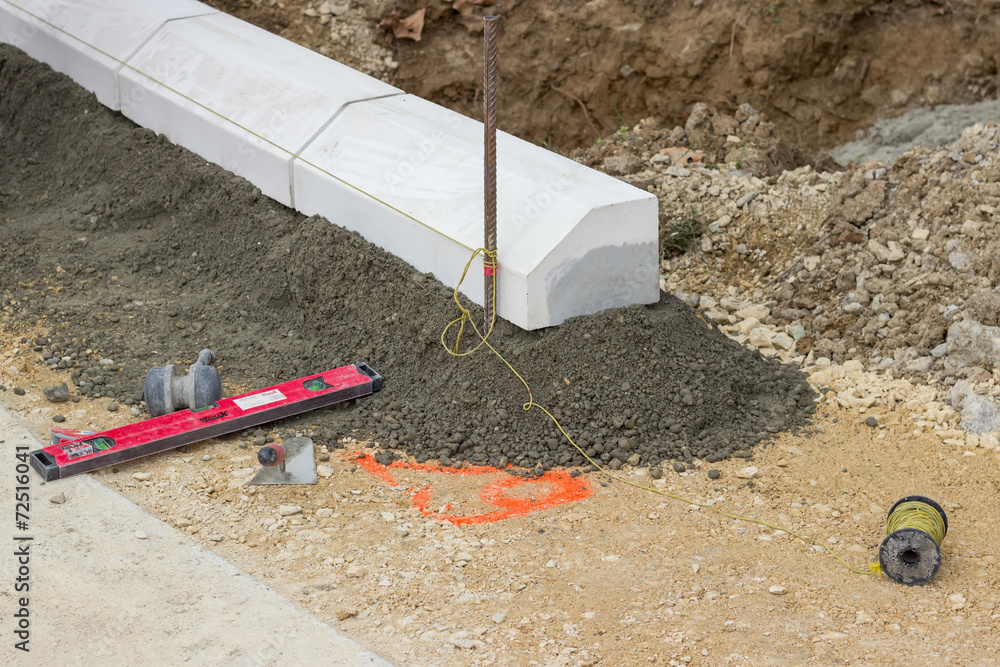 Tools for installing concrete curb stone 2 Stock Photo | Adobe Stock