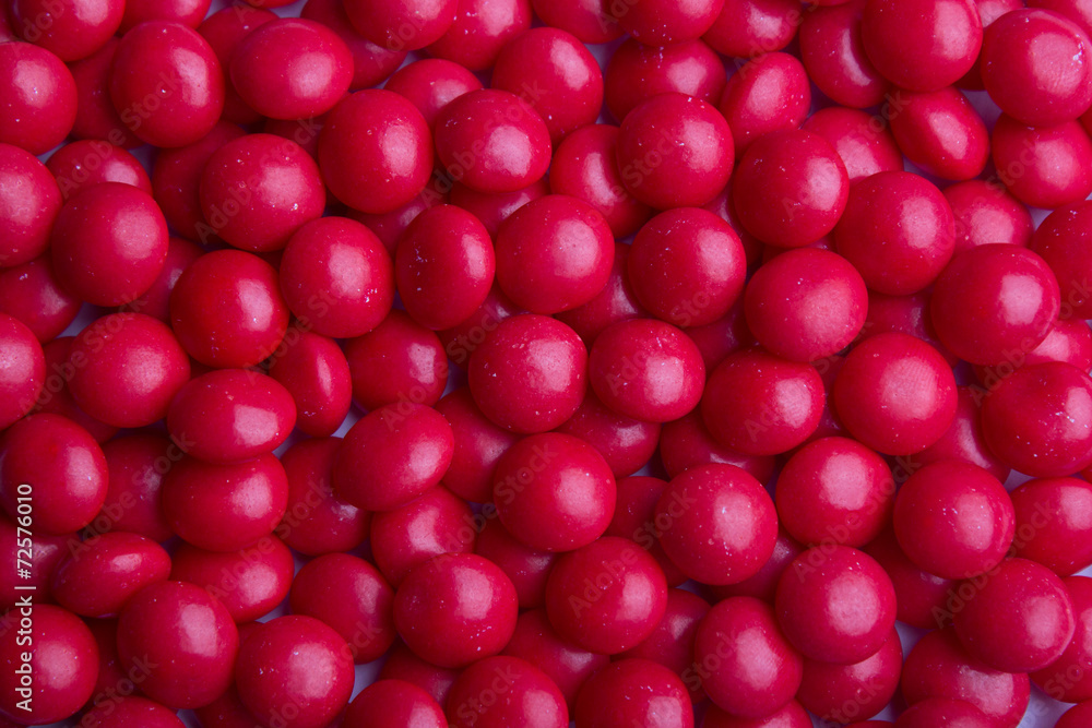 Background of coated red candy Stock Photo | Adobe Stock
