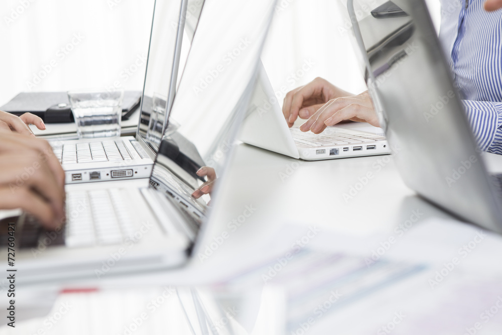 People who are using the laptop have a job Stock Photo | Adobe Stock