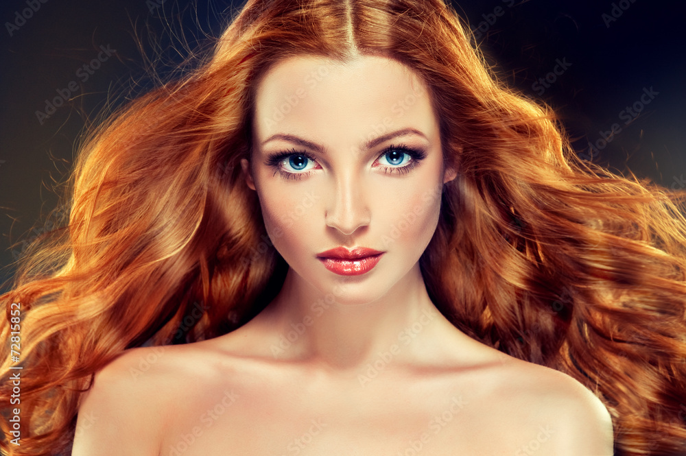 Beautiful model with long curly red hair 스톡 사진 | Adobe Stock