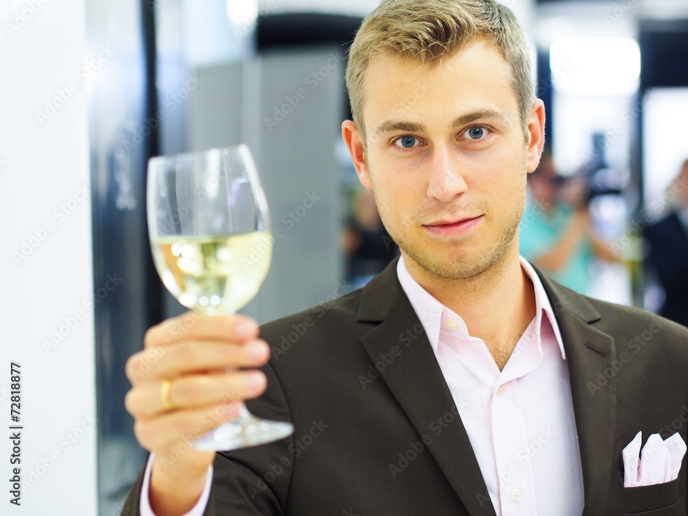 Man toasting on a party Stock Photo | Adobe Stock