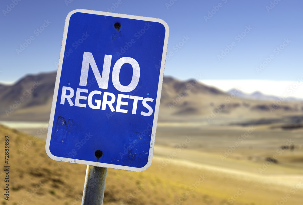 No Regrets sign with a desert background Stock Photo | Adobe Stock