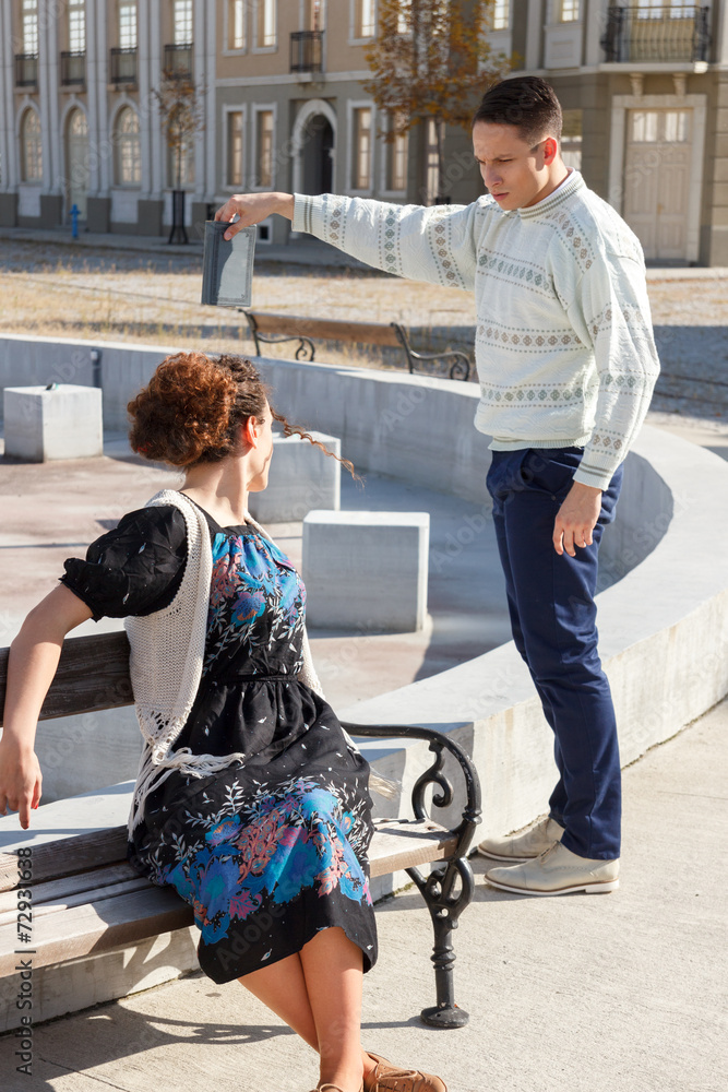 embarrassed woman and angry man arguing and having disagreement Stock ...