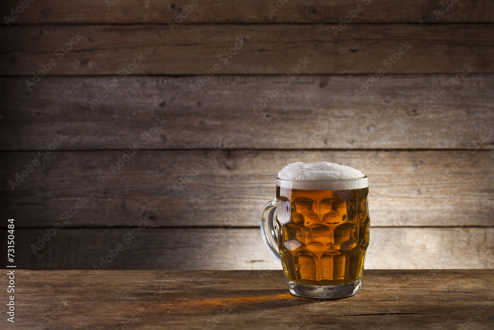 Beer on a wooden background with copy space Stock Photo | Adobe Stock