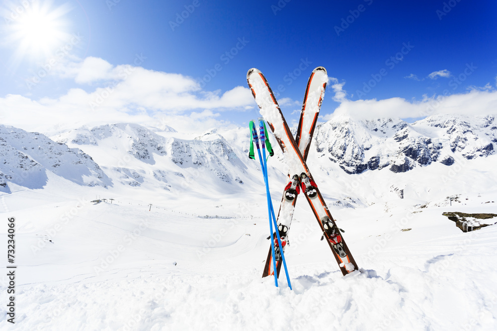 Skiing , mountains and ski equipments on ski run Stock Photo | Adobe Stock