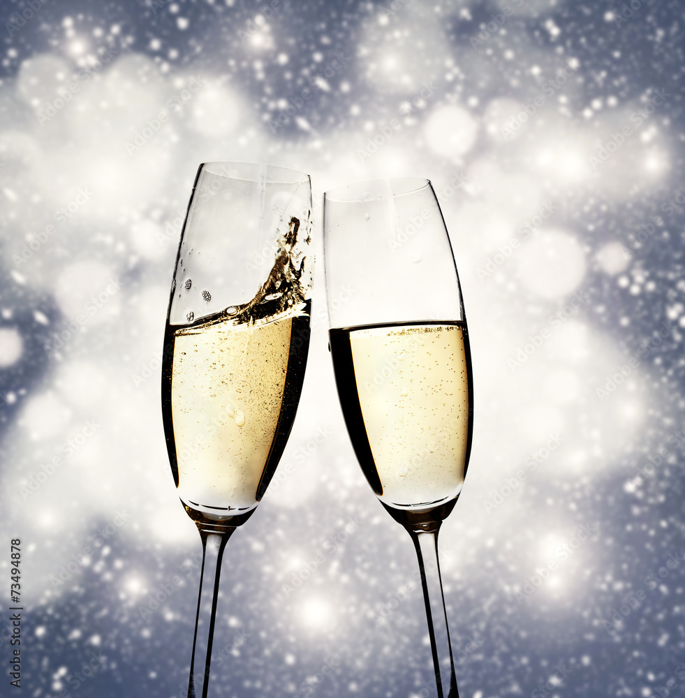 Toasting with champagne glasses on sparkling holiday background Stock ...