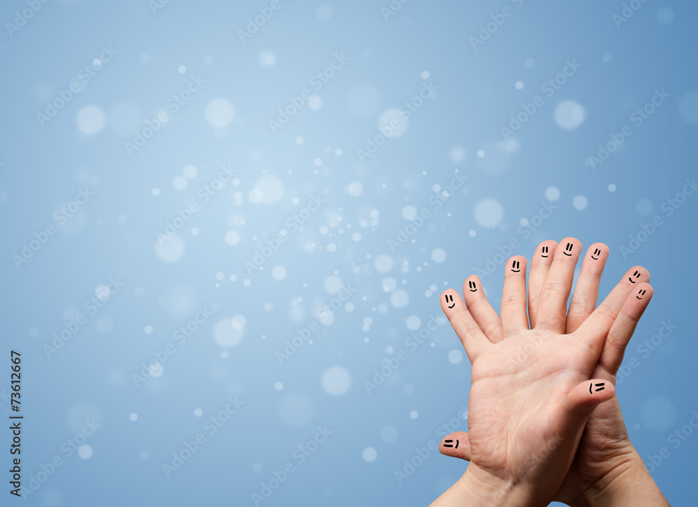 Happy finger smileys with empty blue bokeh background Stock Photo ...
