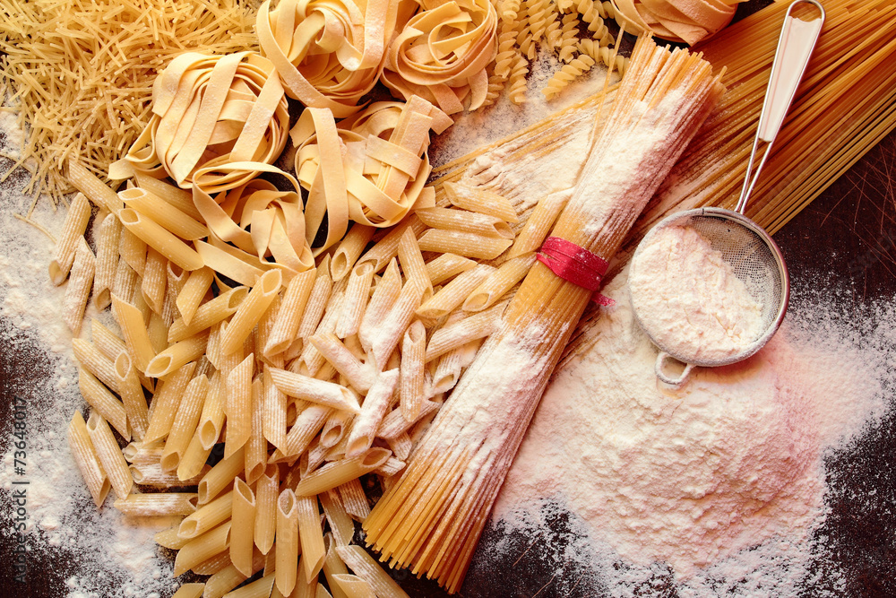 Variety of types and shapes of pasta with white flour Stock Photo ...