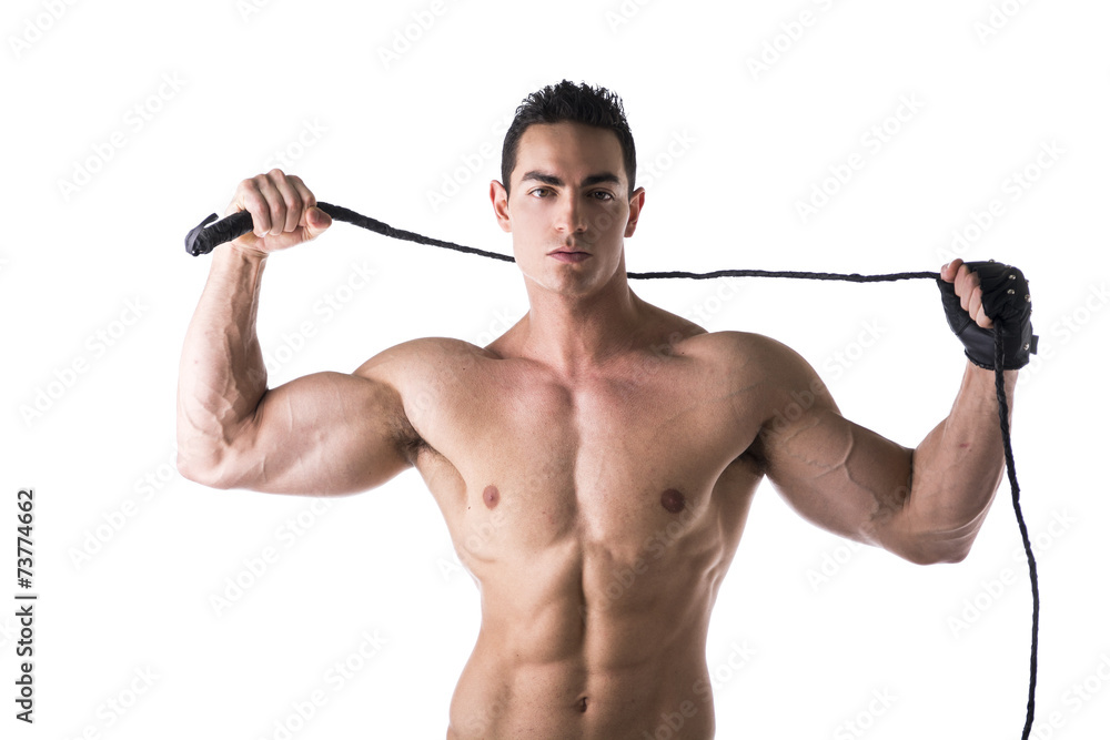 Muscular shirtless young man with whip and studded glove Stock Photo ...