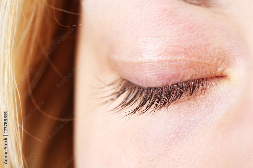 Closed female eye close-up Stock Photo | Adobe Stock
