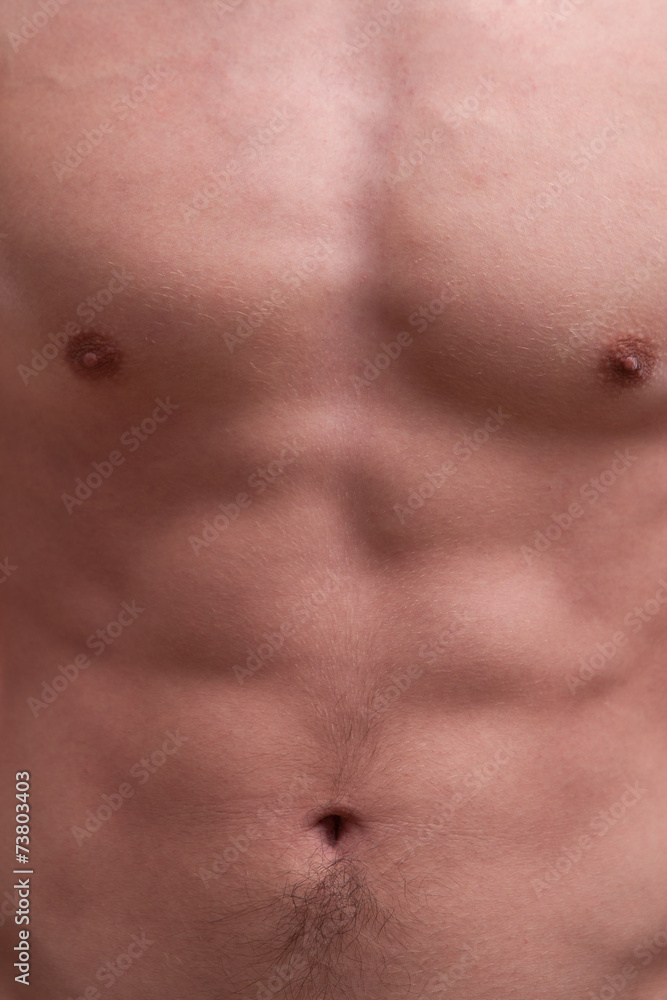 young muscle man chest and abdominals Stock Photo | Adobe Stock