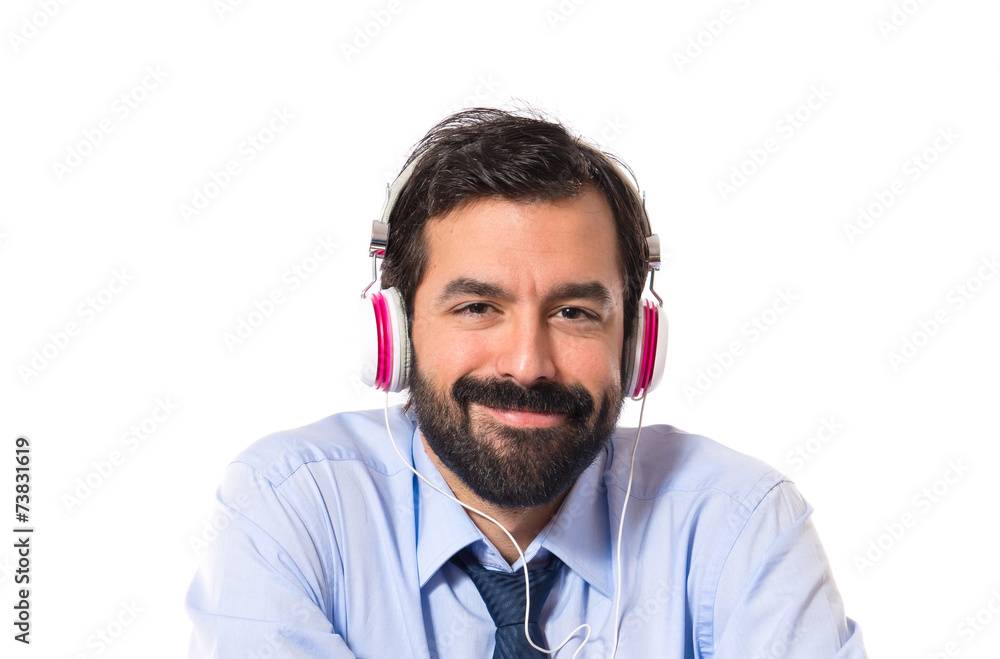 Busienssman listening music over white background. Stock Photo | Adobe ...