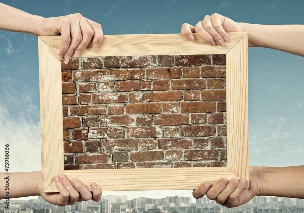 Hands holding frames Stock Photo | Adobe Stock