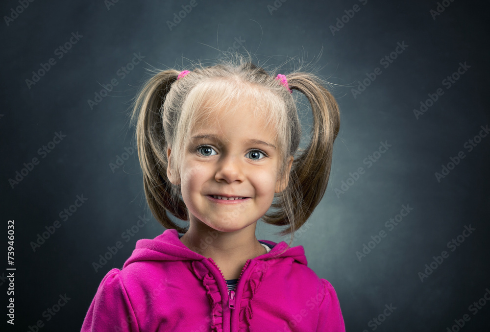Little girl in rose jacket smiling Stock Photo | Adobe Stock
