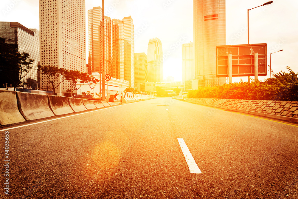 cityscape and traffic trails on the road of modern city Stock Photo ...