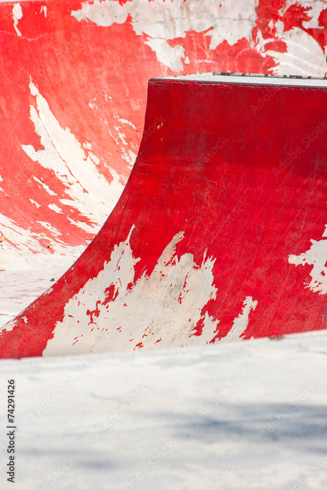 Old red skating ramp with half pipe rail. Stock Photo | Adobe Stock