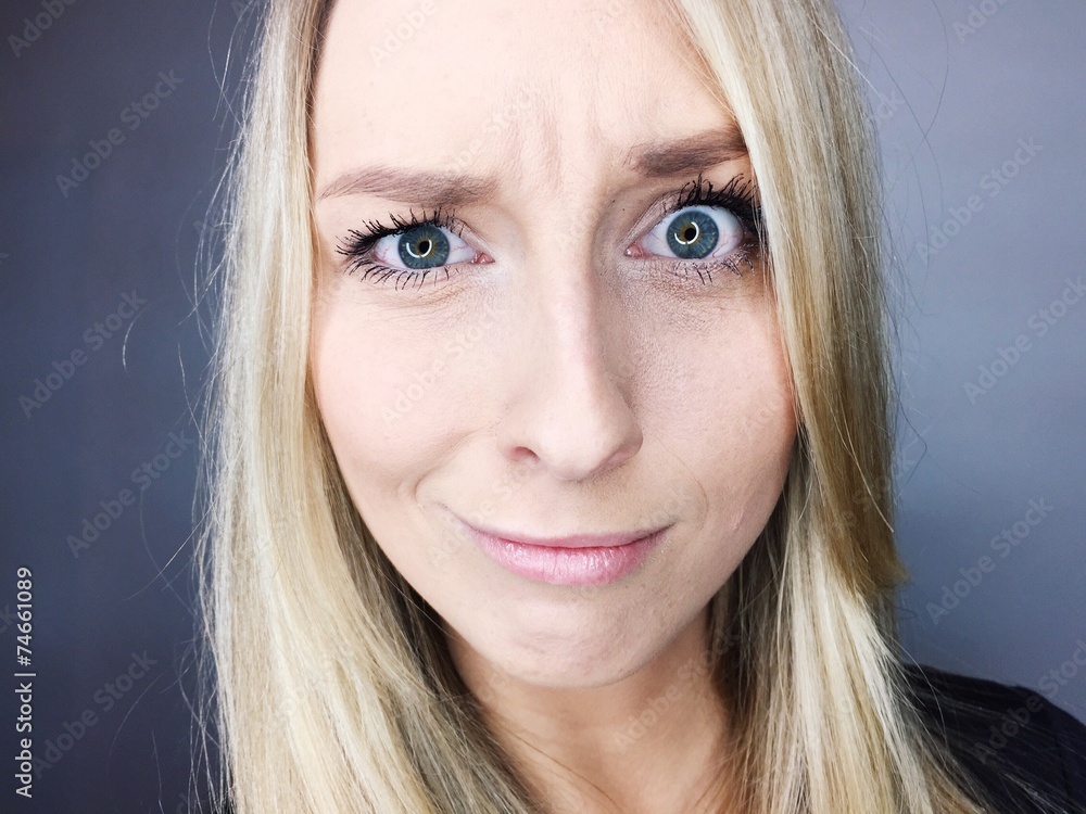 Frau macht Grimasse Stock Photo | Adobe Stock