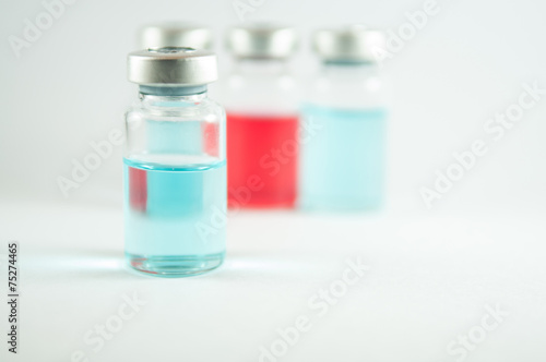 Red liquid in injection syringe and vials #75276492 - Wzory roślinne ...