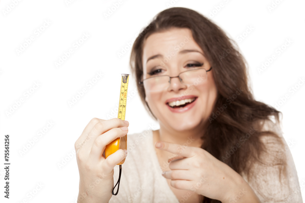 women laughed at the size shown on the measuring tape foto de Stock ...
