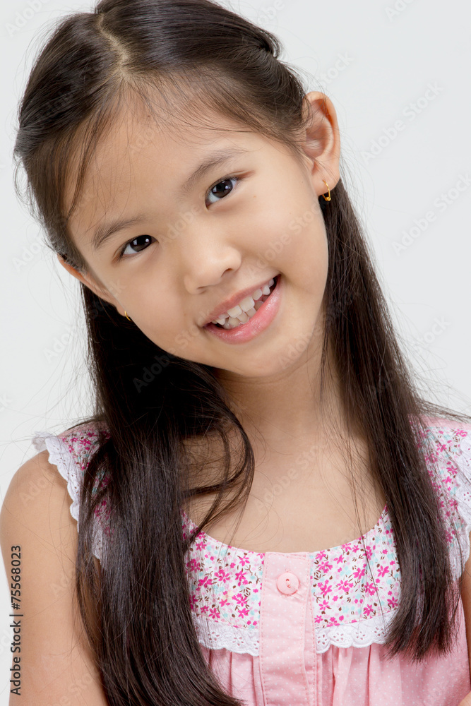 Portrait of happy little Asian child Stock Photo | Adobe Stock