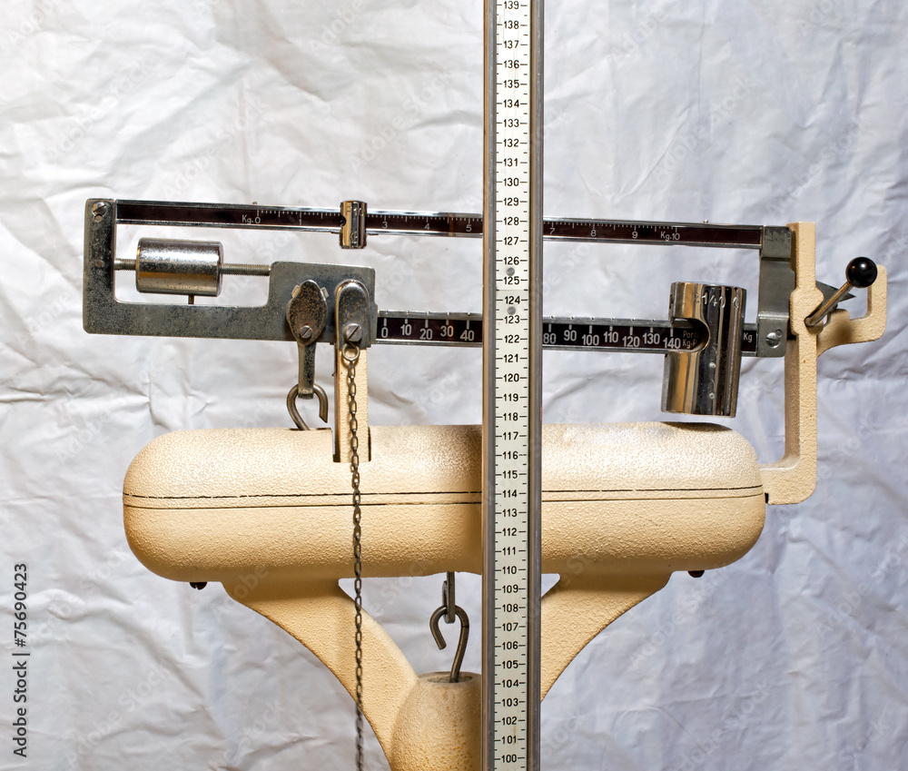 scale with the meter to measure the weight and height of patient Stock ...