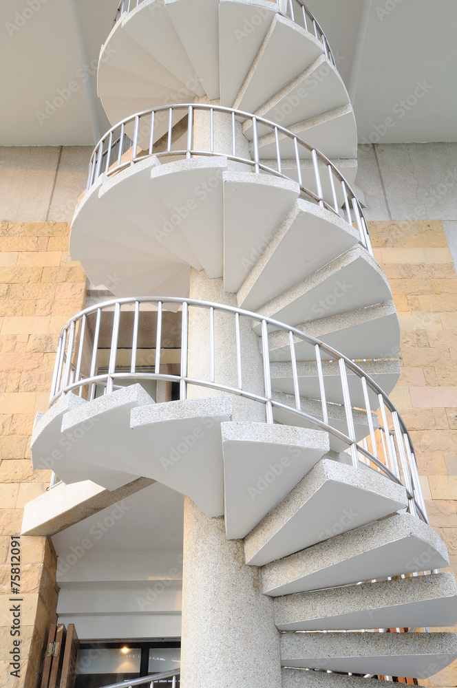White winder stairs with stainless steel handrail Stock Photo | Adobe Stock