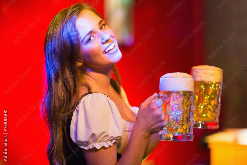 Smiling oktoberfest barmaid with beer Stock Photo | Adobe Stock